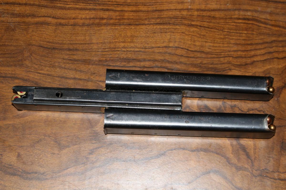 Photograph: G.I. Holding M1A1 Thompson With Taped Stick Magazines ...